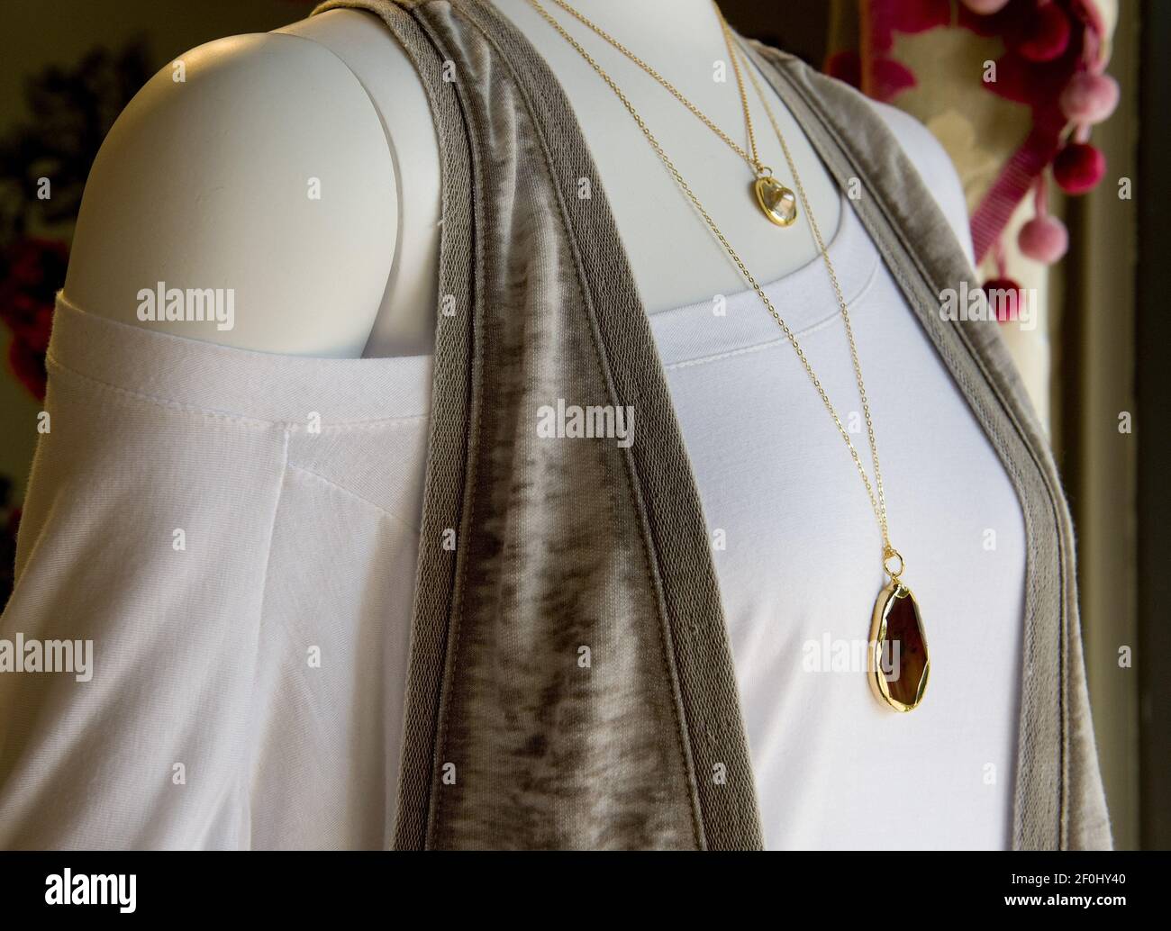 The Maria Lopez designed taupe vest over a white Siro Micromodal Seam-T ...