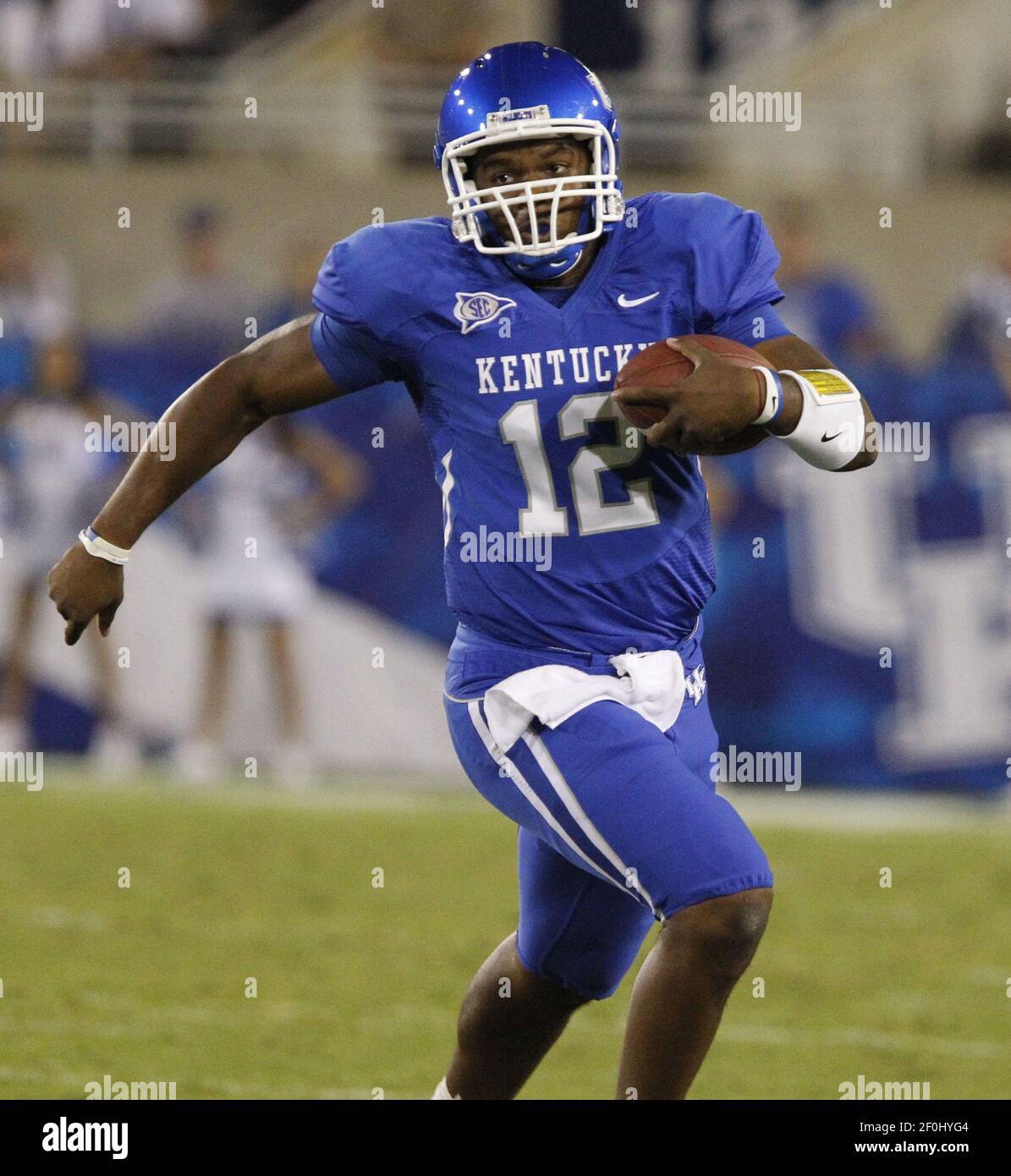Kentucky's backup quarterback Morgan Newton got around the end for a ...