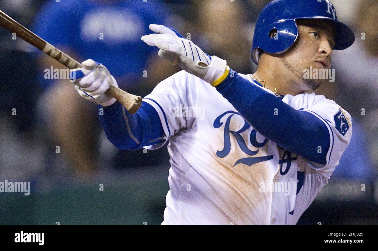 Kansas City Royals' Gregor Blanco follows through on an RBI triple in ...