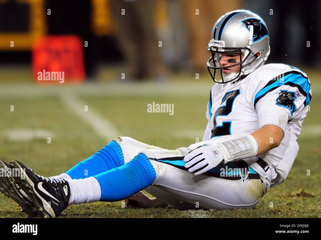 Carolina Panthers quarterback Jimmy Clausen (2) is slow to get up off ...
