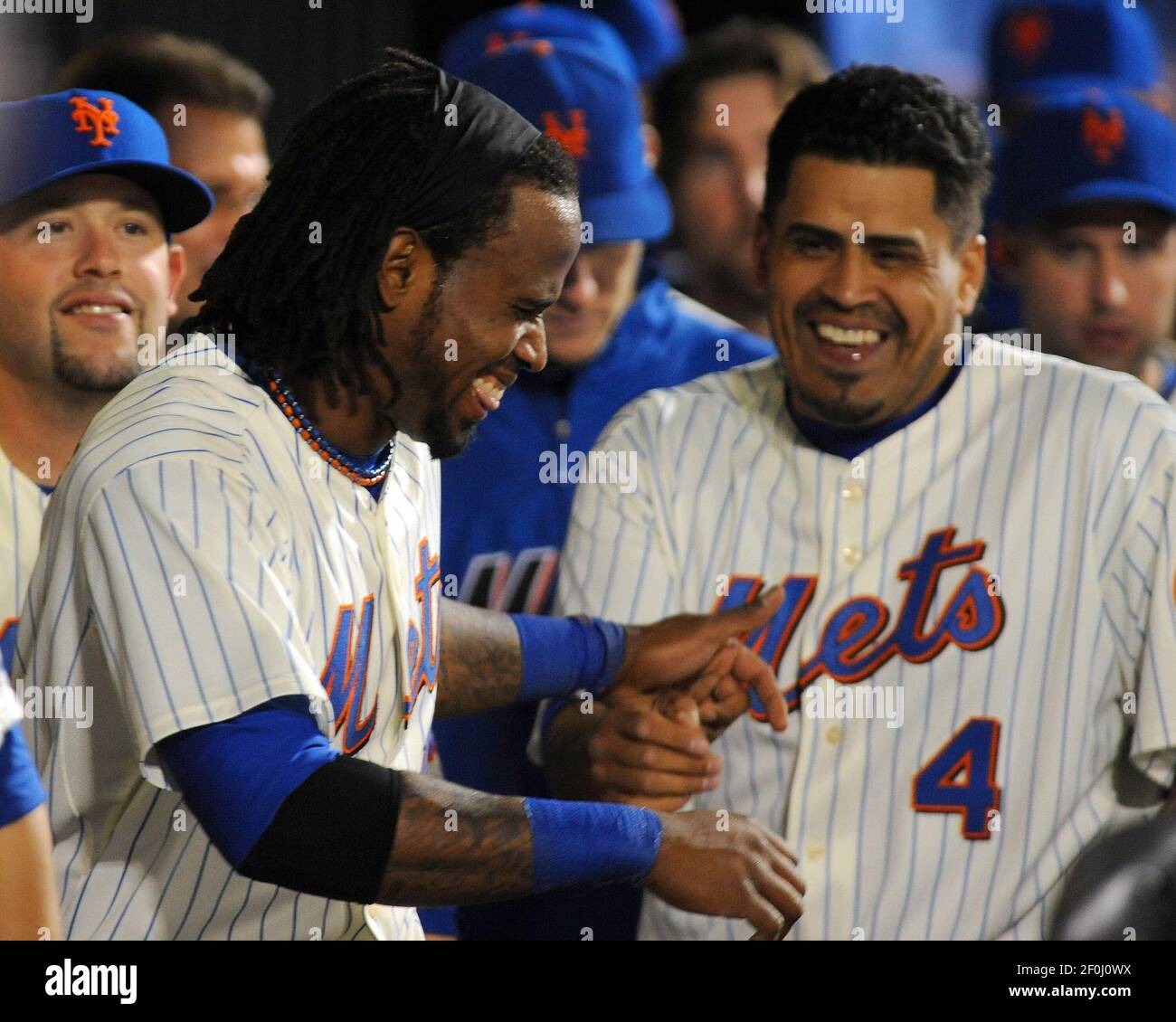 New York Mets' Jose Reyes, left, laughs with teammate Henry Blanco (4 ...