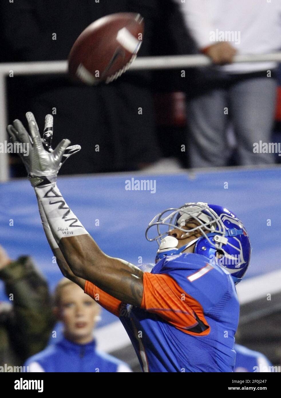 Boise State wide receiver Titus Young hauls in a pass amid the Broncos ...