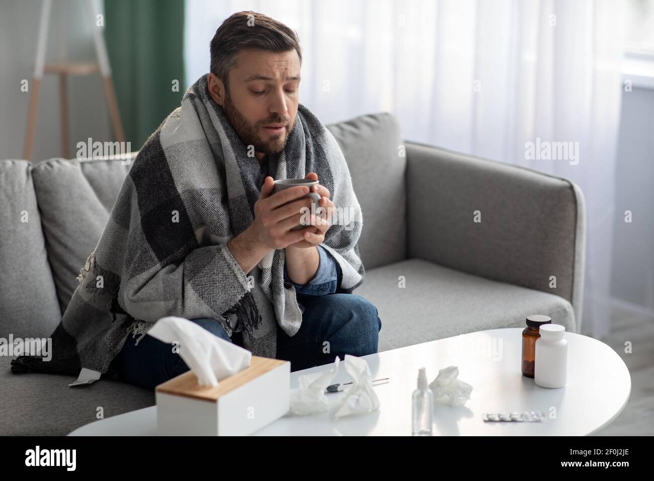 Feeling cold blanket hi-res stock photography and images - Alamy