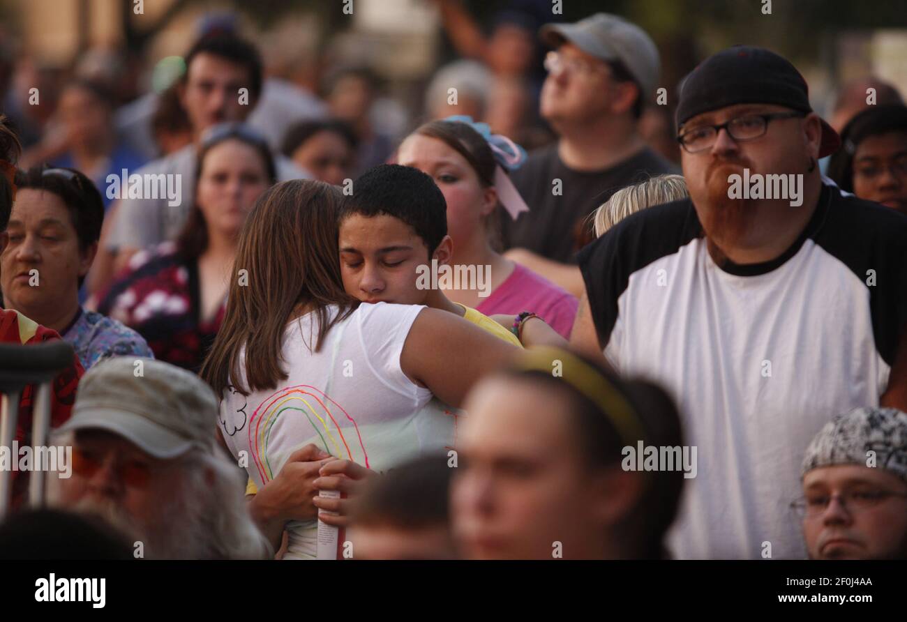 Thousands of people gathered for a candlelight prayer vigil in downtown ...