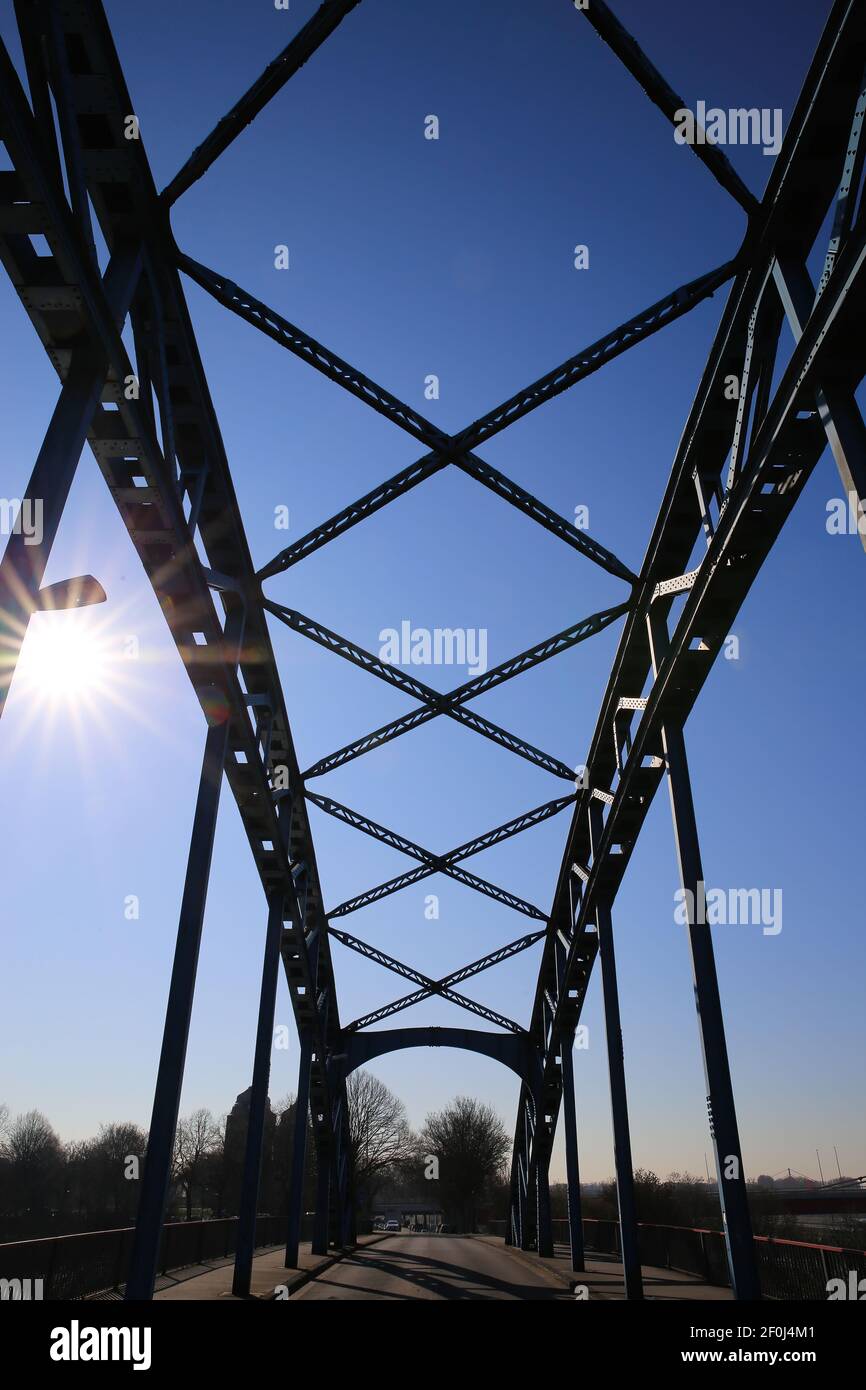 Low angle view on isolated symmetrical industrial steel bridge deck ...