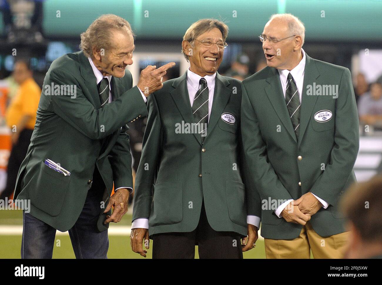 Don Maynard, left, and Joe Namath, center, joke with a member of Weeb ...