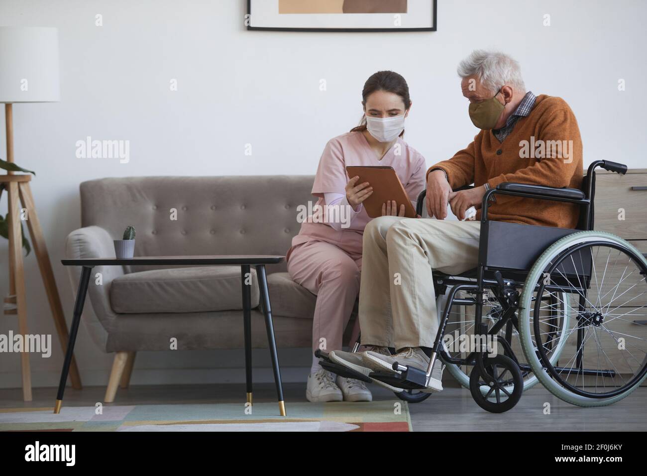 Social worker assisting woman in hi-res stock photography and images ...