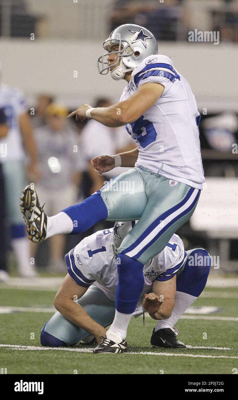 Dallas Cowboys kicker David Buehler kicks out of the hold of Mat ...