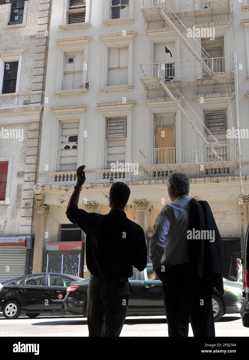 People look at the site of the proposed mosque and Islamic center on ...