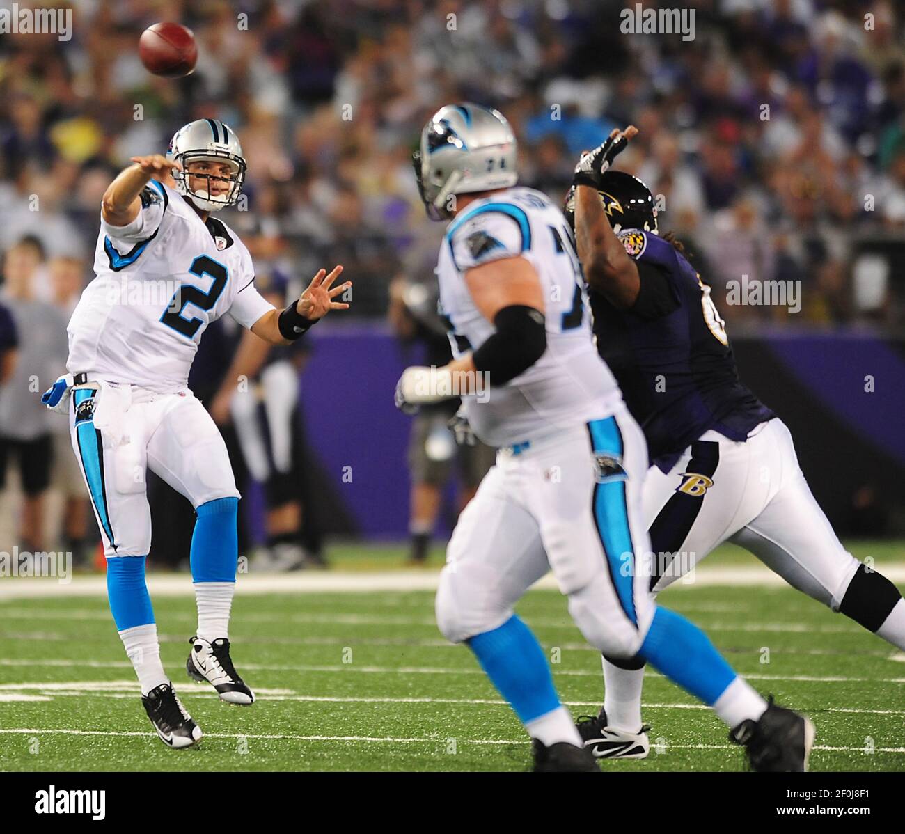 Carolina Panthers rookie quarterback (2) Jimmy Clausen rolls out to ...