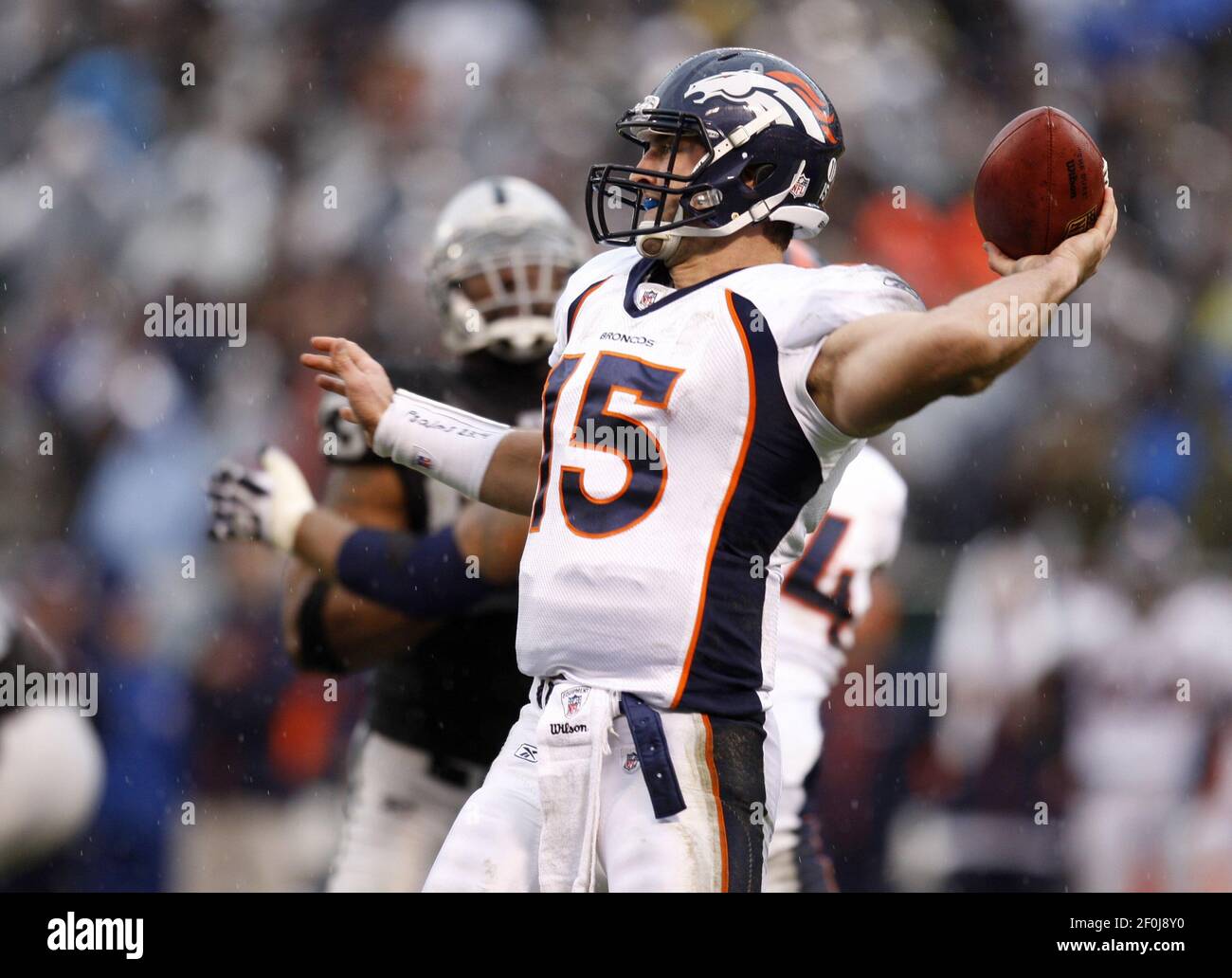 Denver Broncos starting quarterback Tim Tebow (15) makes a throw ...