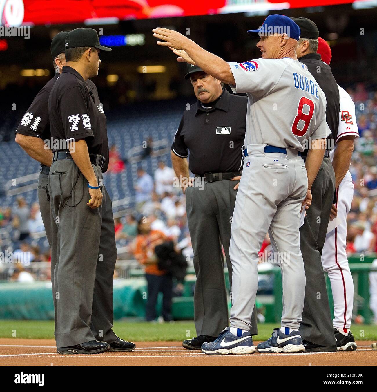 New Chicago Cubs Manager Mike Quade (8) discusses the ballpark layout ...