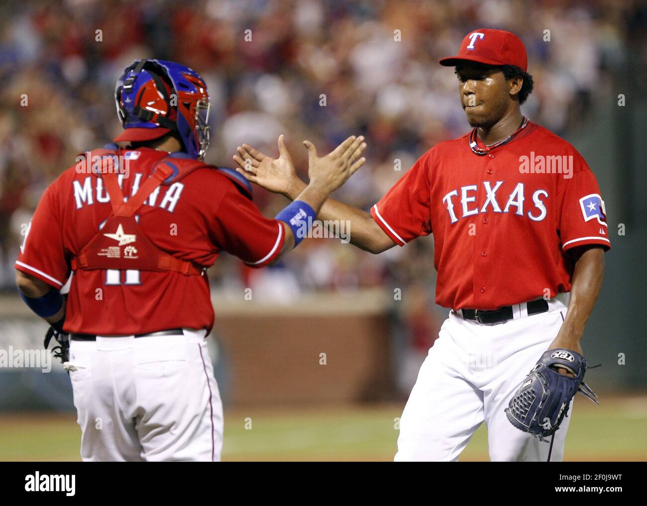 Texas Rangers catcher Bengie Molina congratulates relief pitcher ...