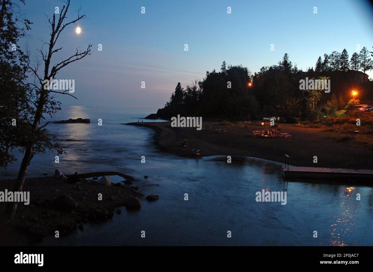 Nightly bonfires draw families to the beachfront at Lutsen Lodge and ...