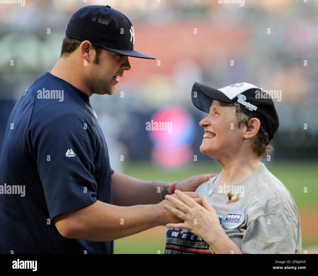 New York Yankees' Joba Chamberlain, left, greets HOPE week ...