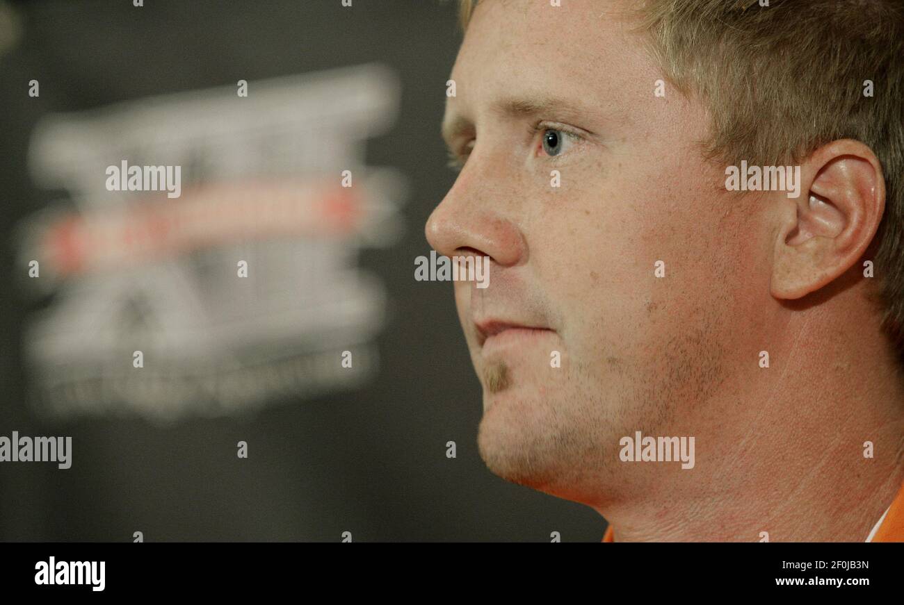Oklahoma State University quarterback Brandon Weeden conducts an ...