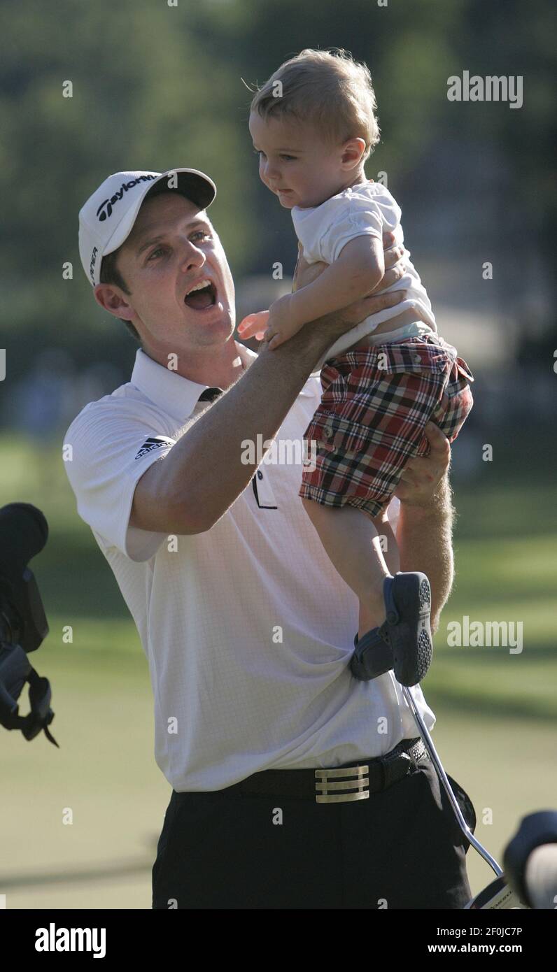 Justin Rose lifts up his son, Leo, after winning the AT&T National PGA ...