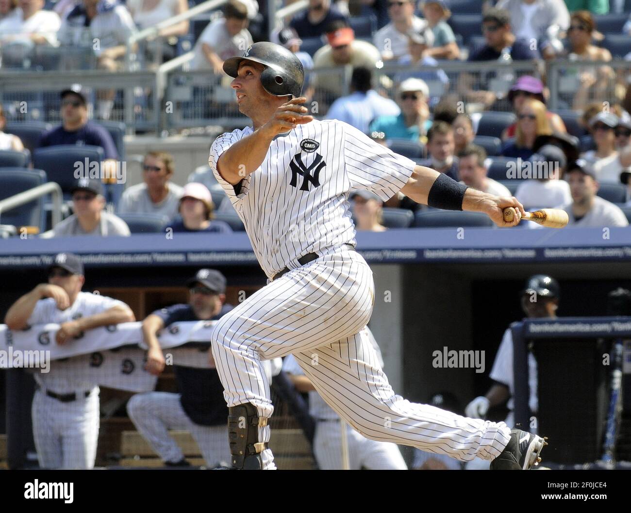 New York Yankees catcher Jorge Posada hits a two-run double in the ...