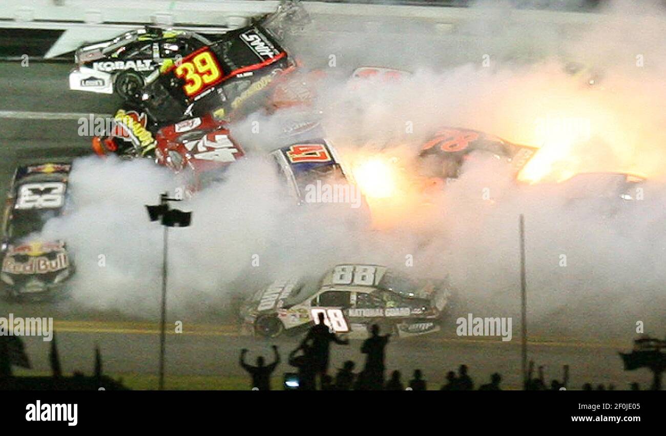 Several cars crash and burn during a wreck in the final laps of the ...