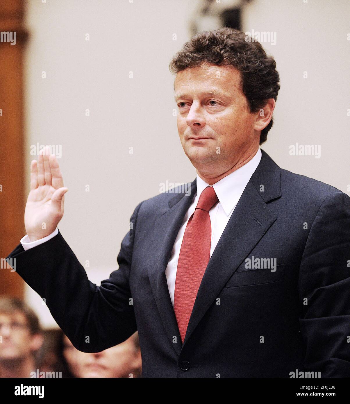 BP Chief Executive Tony Hayward is sworn in before giving his opening ...