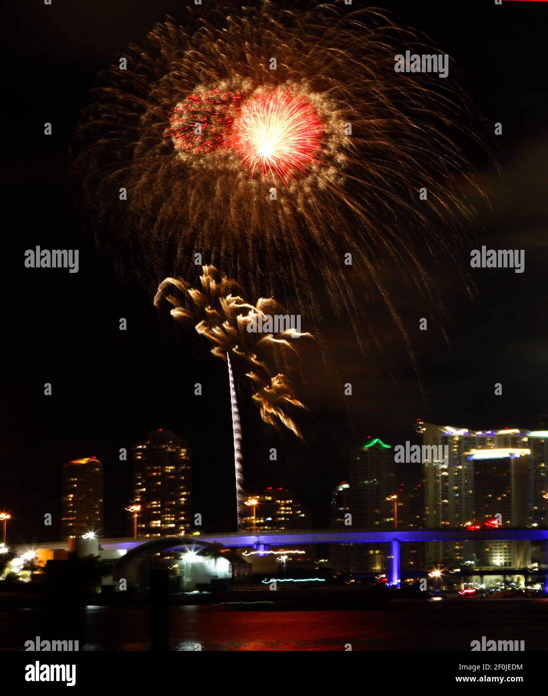 Fireworks explode over the Miami, Florida skyline and Biscayne Bay ...