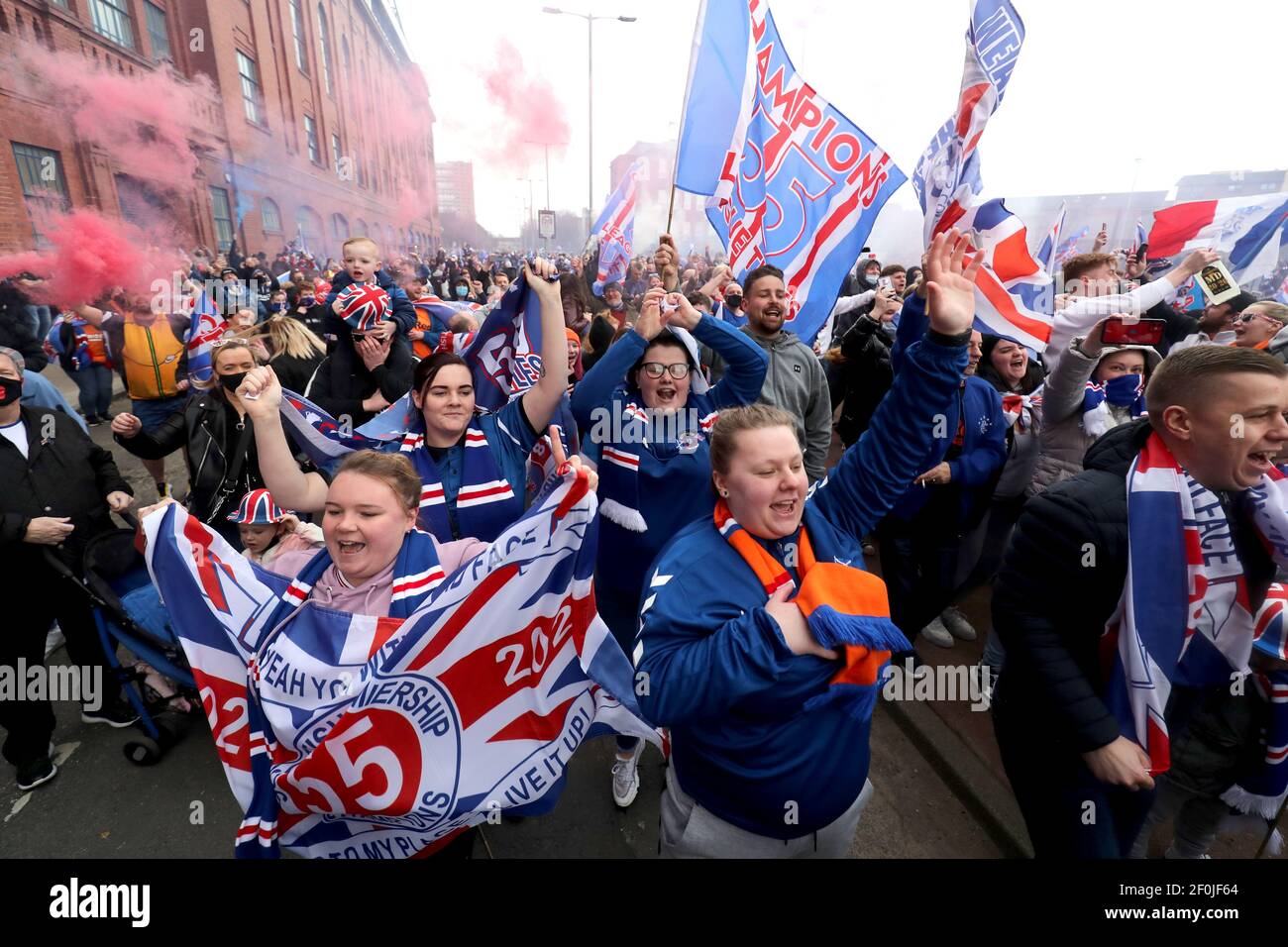 Rangers fans celebrate outside of the Ibrox Stadium after Rangers win ...
