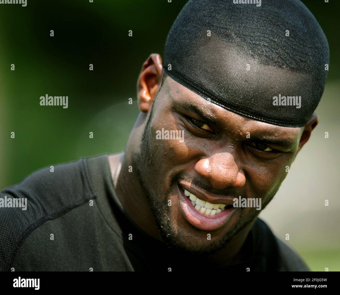 Carolina Panthers linebacker Jon Beason waits to be interviewed ...