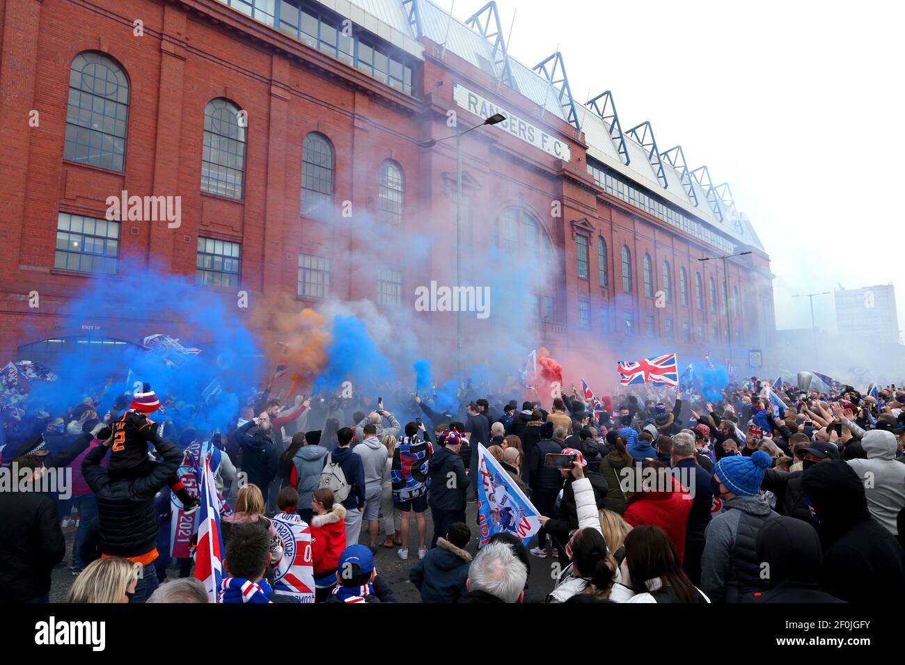 Rangers fans celebrate outside of the Ibrox Stadium after Rangers win ...