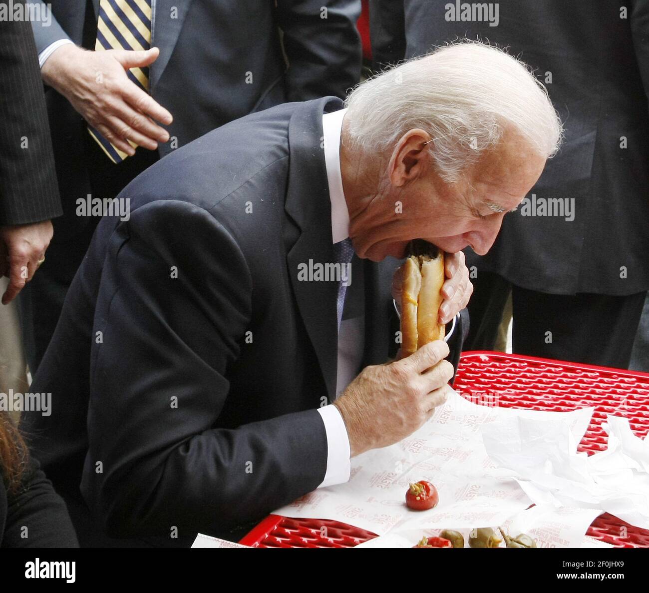 Vice President Joe Biden eats a cheese steak with wiz during his ...