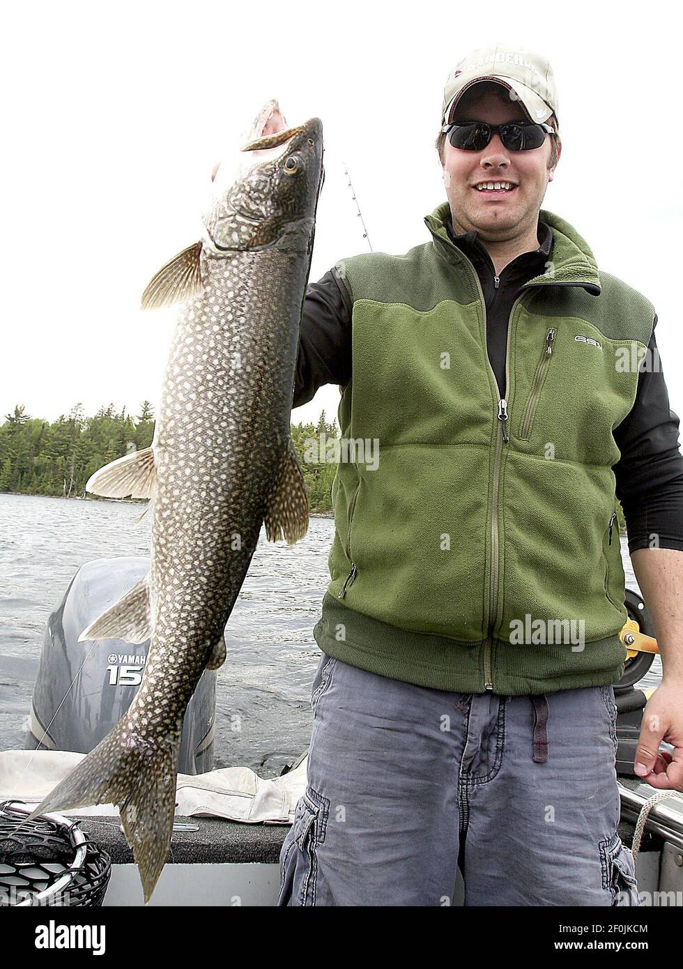 Matt Morgan, of Duluth, Minnesota, holds a nice lake trout that he ...