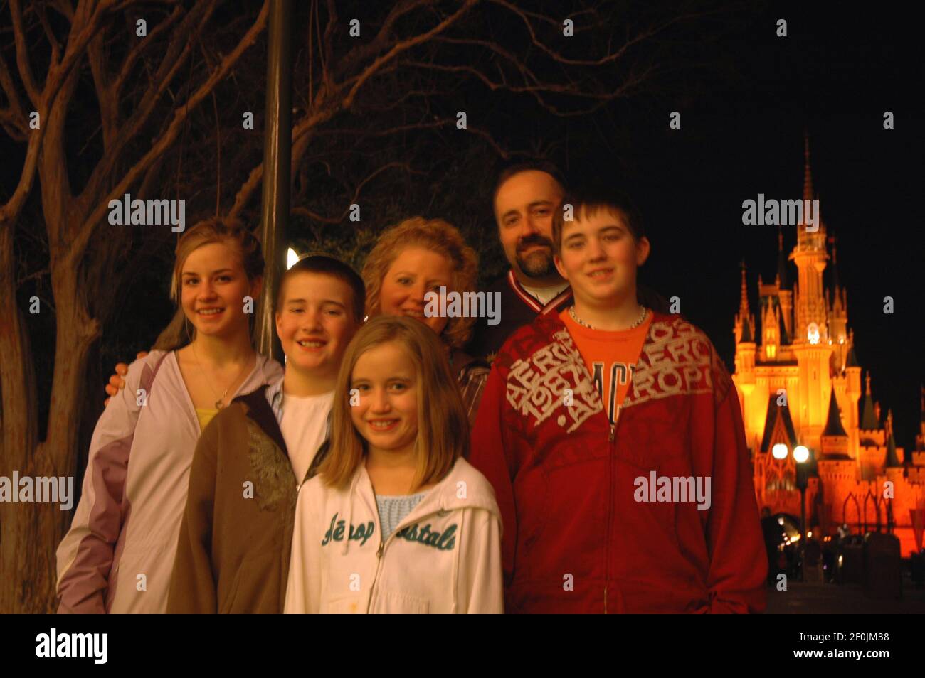 Tim and Linda Koltes, background center, of Avon, pose for portrait ...