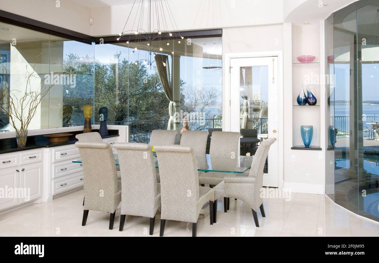 Above, the dining area boasts both a family-size table and ample built ...