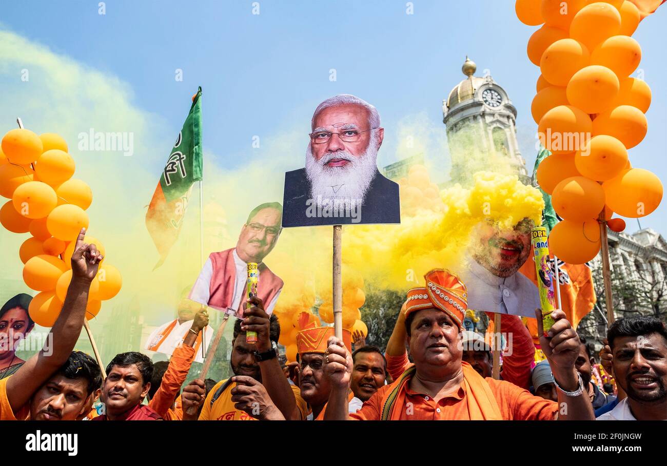 BJP supporters hold placards during a mass rally.Bharatiya Janata Party ...