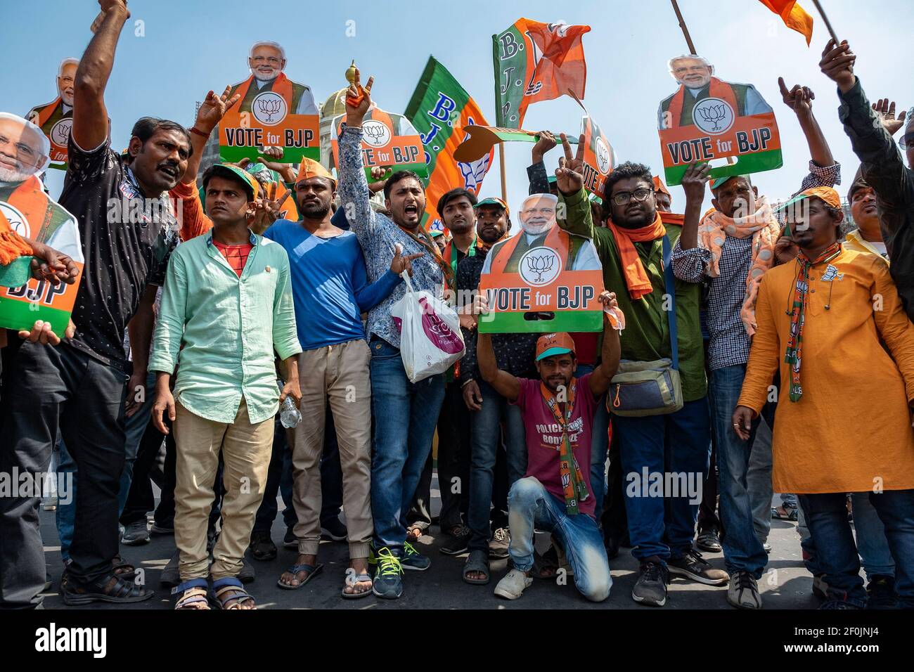 Bharatiya Janata Party (BJP) supporters chant slogans during a mass ...