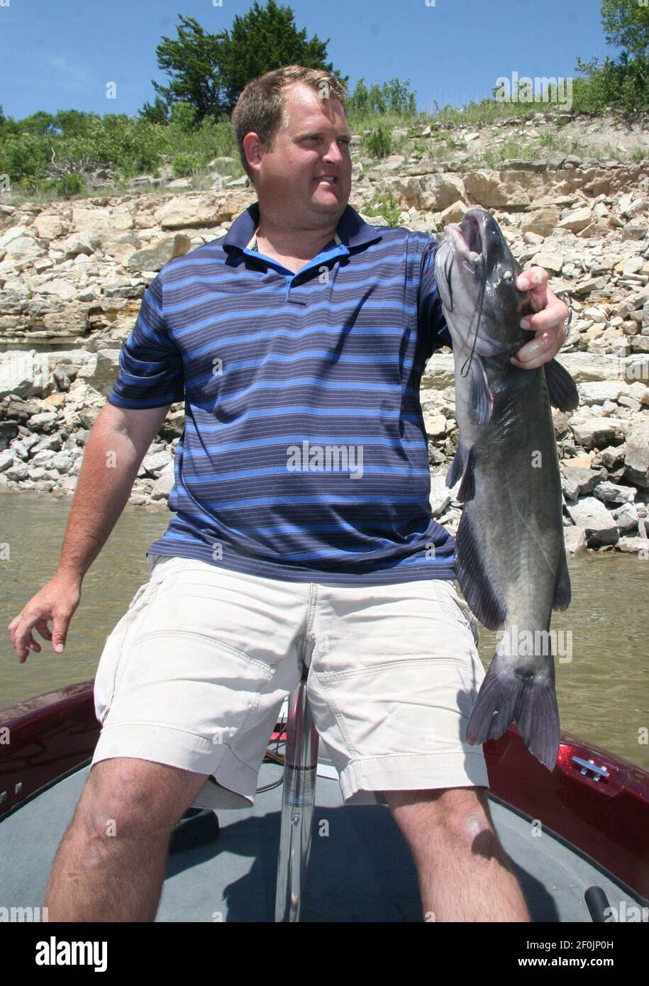 Jeff Hawkinson poses for a recent portrait with a six-pound male ...