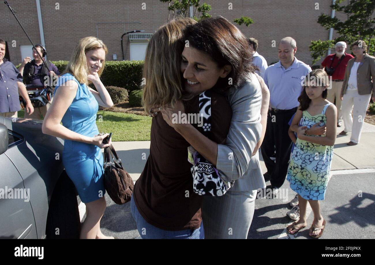 Nikki Haley greets friend Jennifer Sisk after casting her vote on ...
