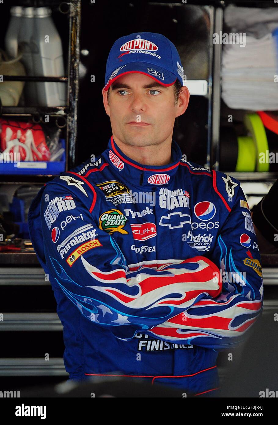 Sprint Cup Series driver Jeff Gordon waits for his crew to finish ...