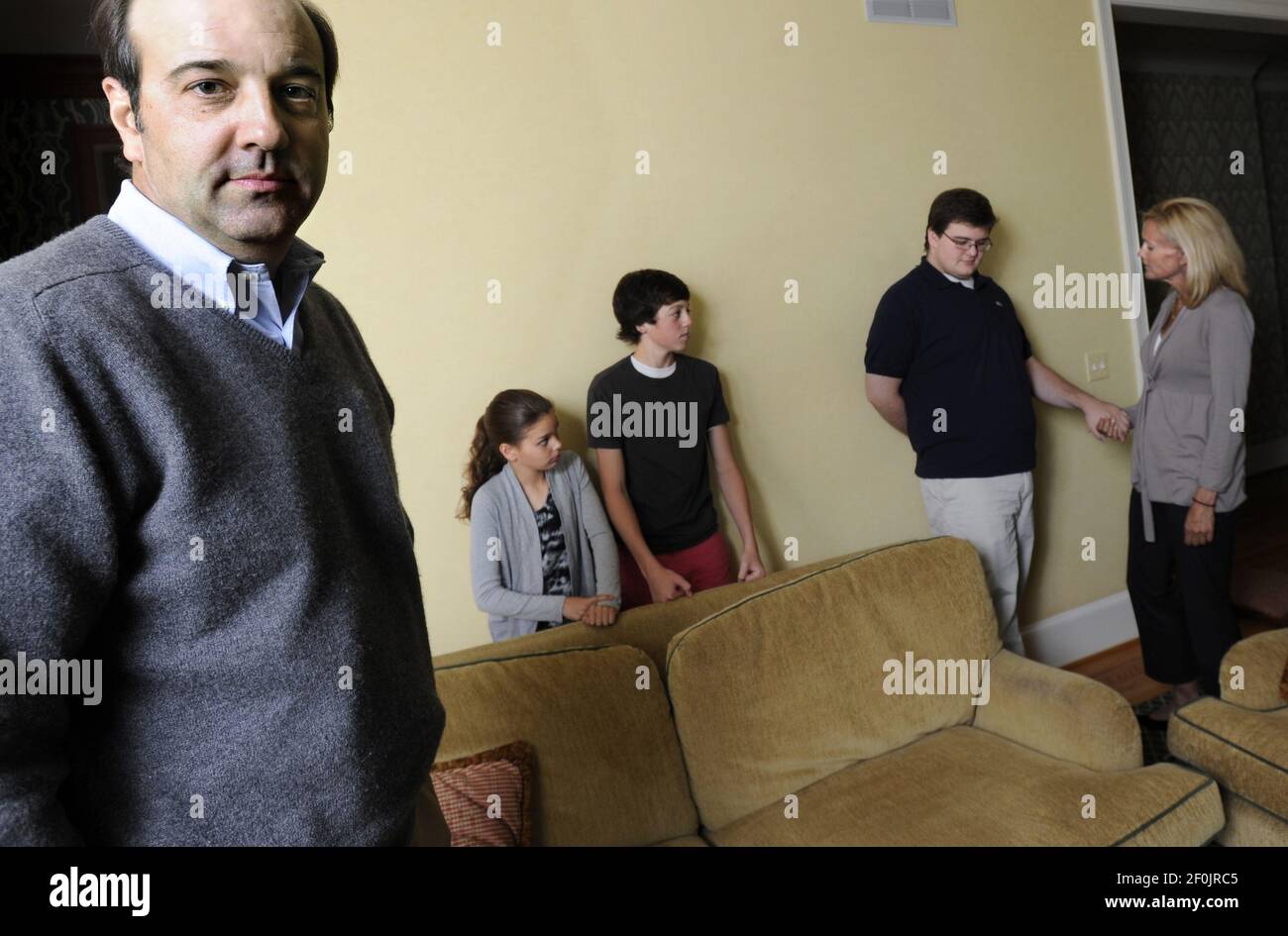 John Gillin, left, and his wife Pam, far right, are pictured in their ...