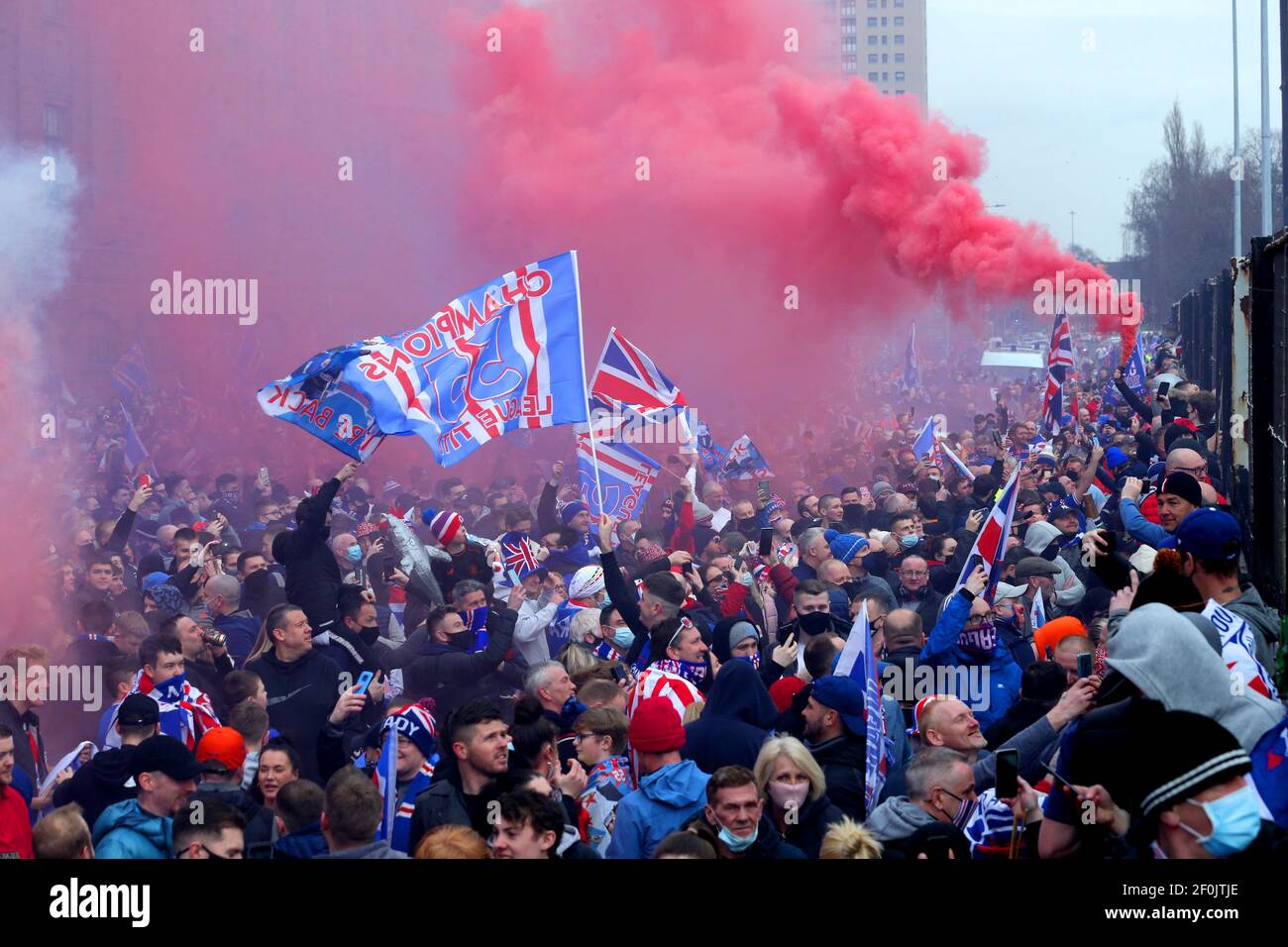 Rangers fans celebrate outside of the Ibrox Stadium after Rangers win ...