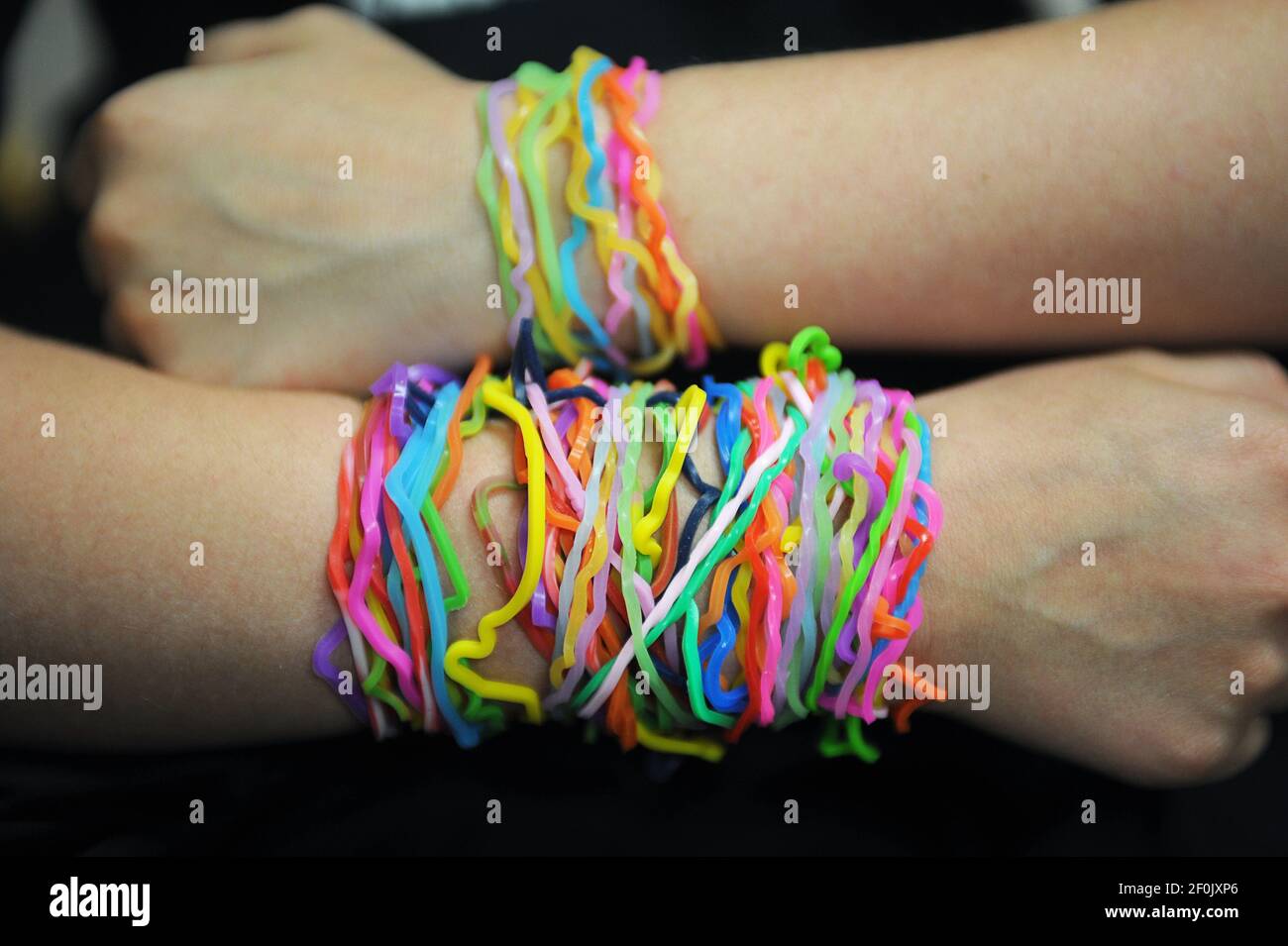 Josh Joffe, 10, shows off his Silly Bandz, which are bands of different ...