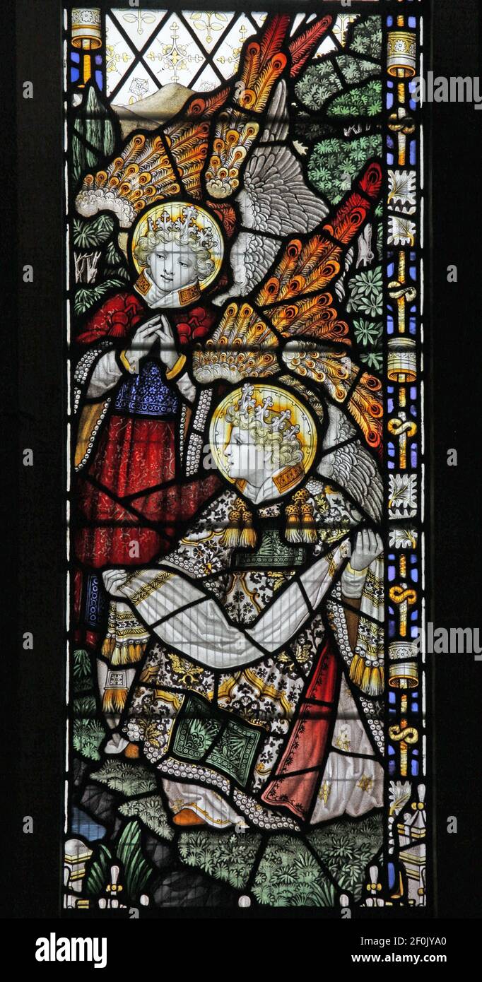 A stained glass window by C E Kempe & Co. depicting angels witnessing ...