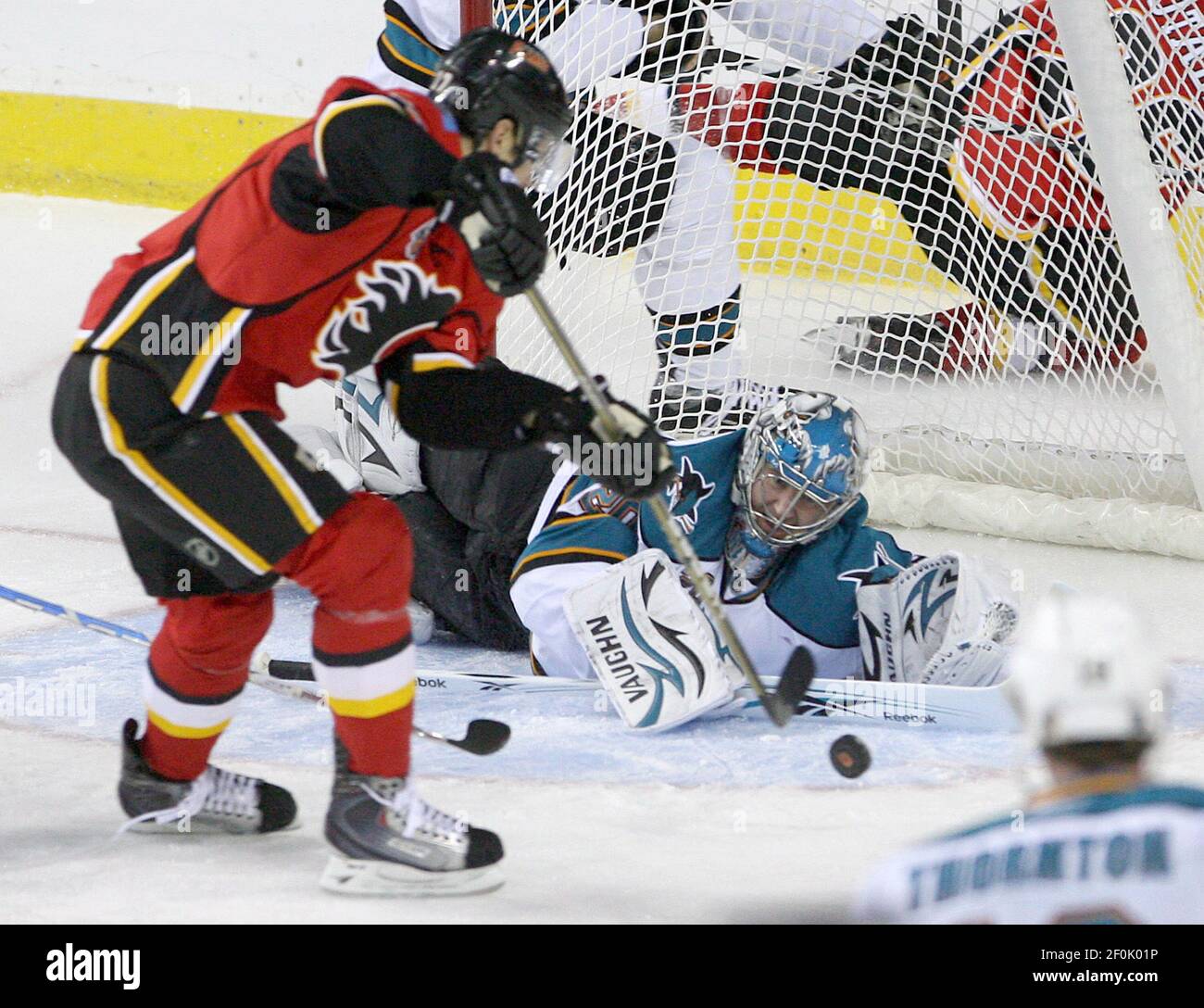 The Calgary Flames' Rene Bourque attempts to score on the San Jose ...
