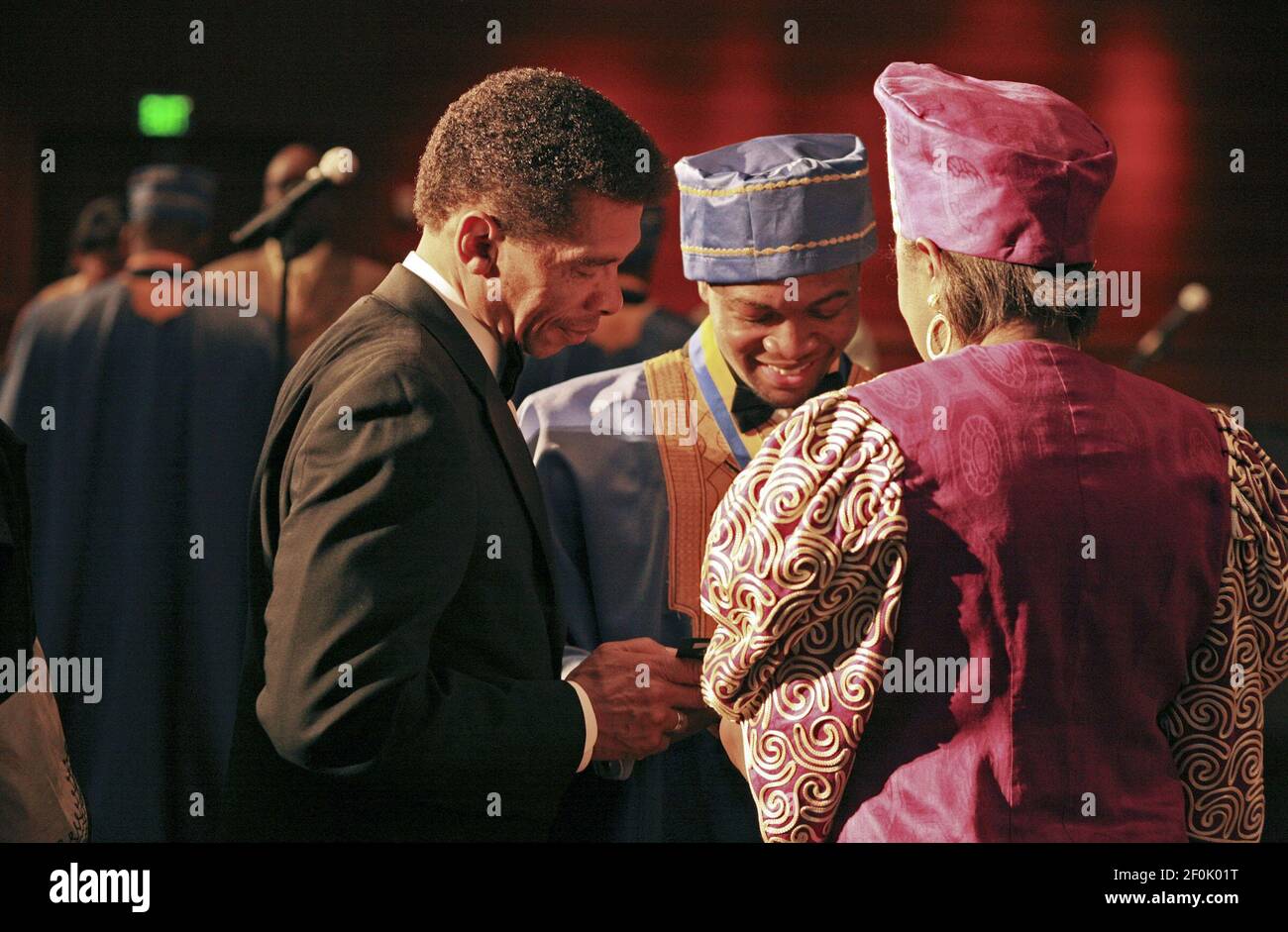 Jason Steele, center, greets his parents, J.D. Steele, left, and CeLois ...