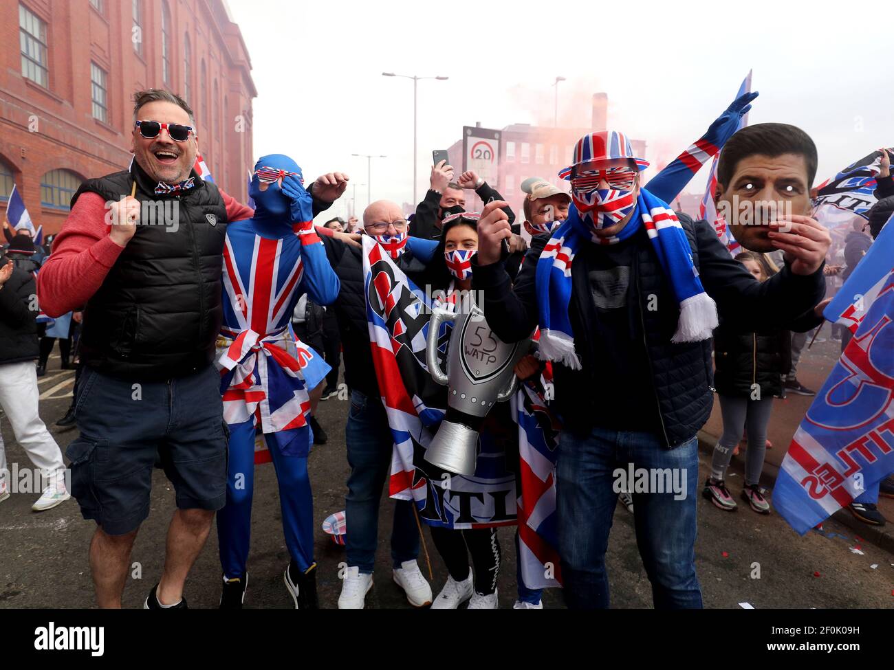 Rangers fans celebrate outside of the Ibrox Stadium after Rangers win ...