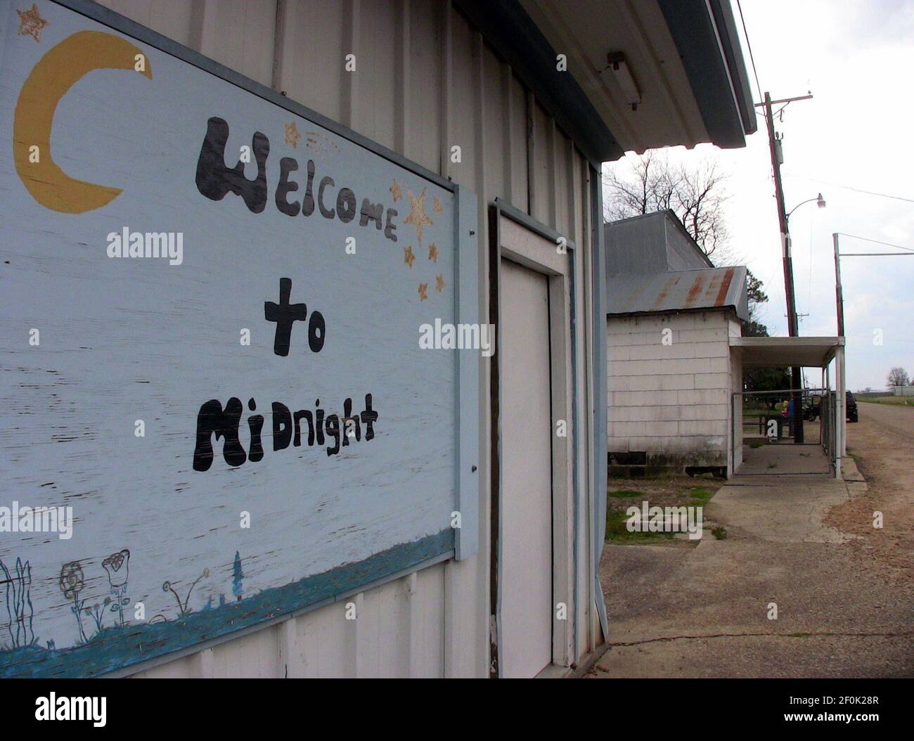 A hand-painted sign welcomes visitors to Midnight, Mississippi, a ...
