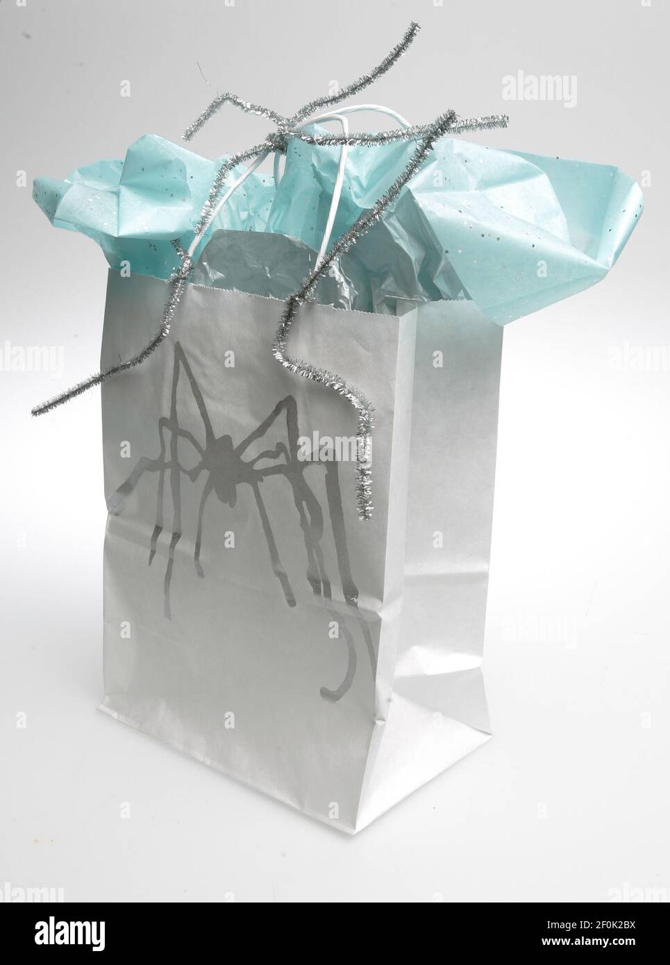 Get creative with gift wrapping this holiday season. This spider bag ...