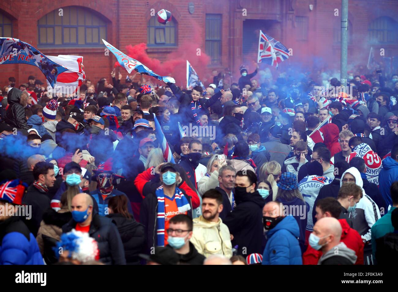 Rangers fans celebrate outside of the Ibrox Stadium after Rangers win ...