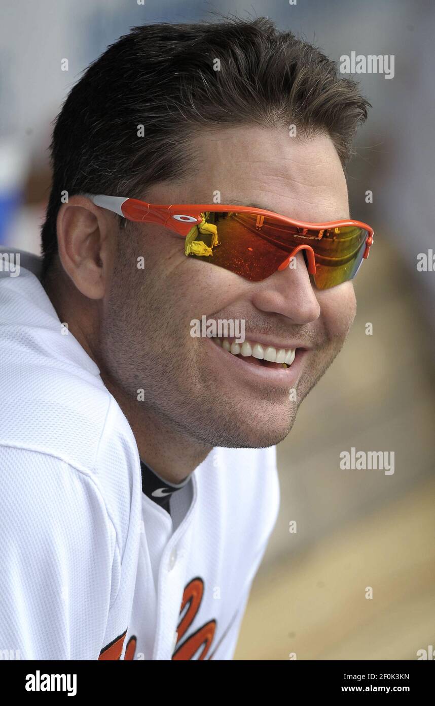 Baltimore Orioles Luke Scott smiles in the dugout after his grand-slam ...