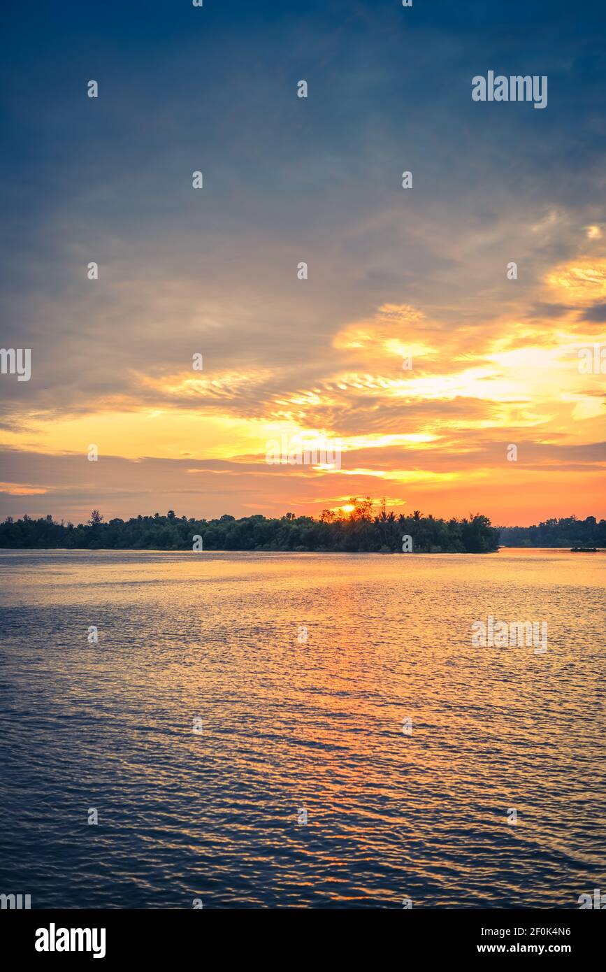 Amazing sunset over the river Stock Photo - Alamy