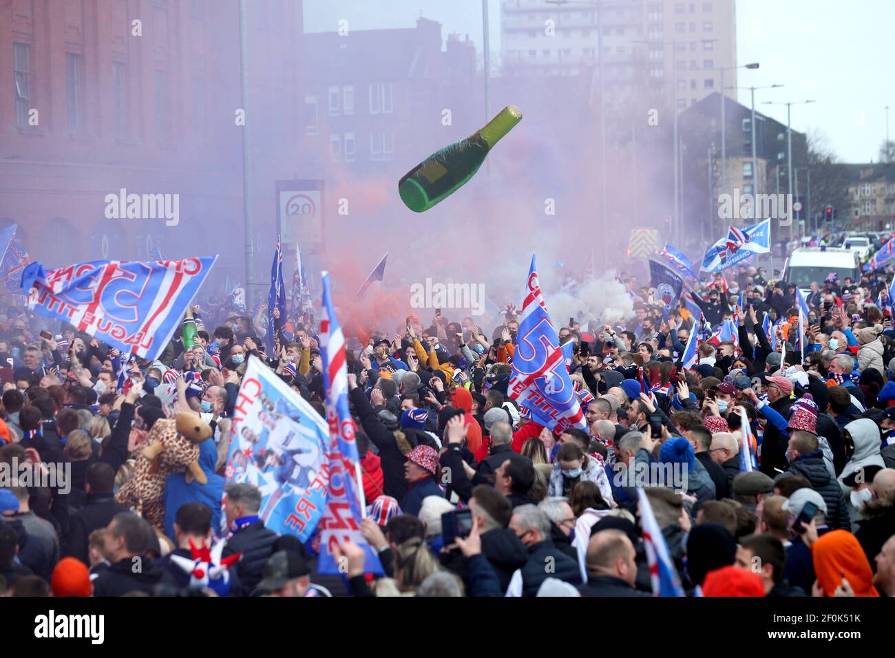 Rangers fans celebrate outside of the Ibrox Stadium after Rangers win ...